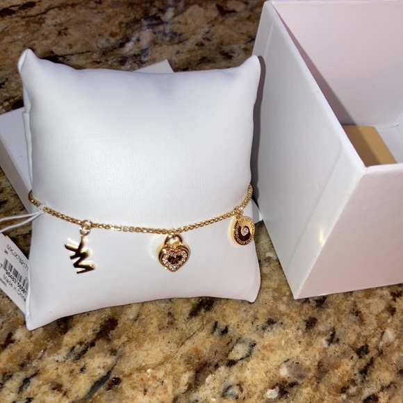 MICHAEL Michael Kors | Jewelry | Michael Kors Logo Bolo Charm Bracelet ...